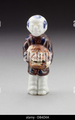 Netsuke. Child and lion mask. Japan. Ivory. Paris, Cernuschi museum ...