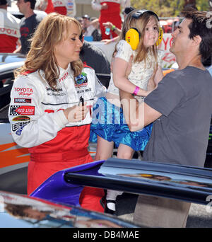 Megyn Price with her daughter Grace and husband Eddie Arts Loving ...