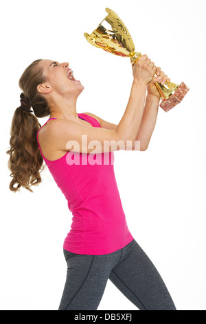 happy girl hold trophy. Sport success. Gold prize. Cute athlete being ...