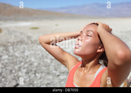 Thirst - dehydrated thirsty woman sweating in Death Valley desert, USA ...