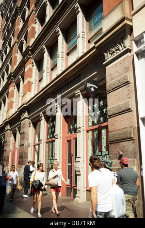 Converse Chuck Taylor All Stars tennis shoes displayed on the wall at ...