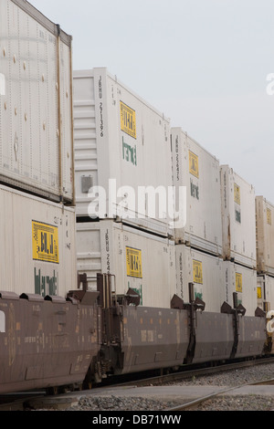 JB Hunt Freight Containers on a BNSF double stack intermodal freight train at Gainesville Texas ...