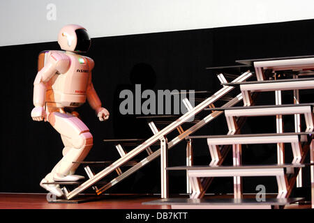Honda's ASIMO robot performs walking, running, dancing, climbing stairs ...