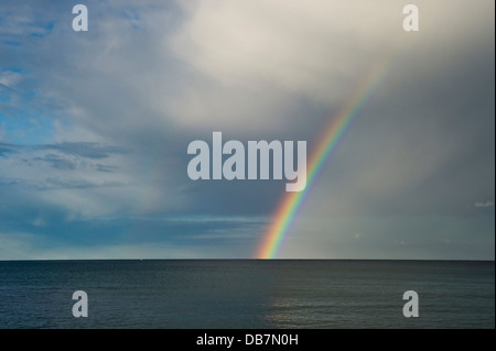 Rainbow over sea Stock Photo - Alamy