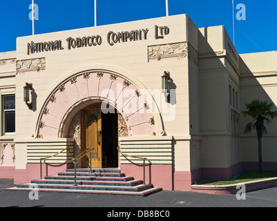 An Art Deco 1930's style building, reflected in an old millpond on the ...