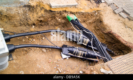 Underground electricity cable junction box being installed Stock Photo ...