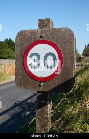 30 mile per hour mph sign on road through avebury Stock Photo: 58601050 ...