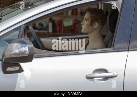 Mannequin in Drivers Seat of a car Stock Photo - Alamy