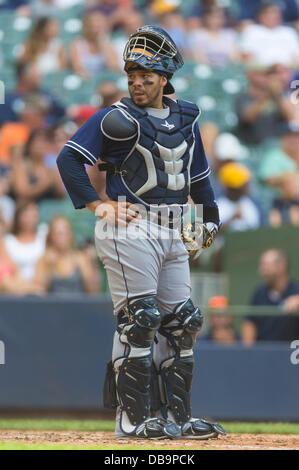 San Diego Padres' Rene Rivera chases a shoulder high strike to make the ...