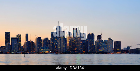 Toronto sunset over lake panorama with urban skyline Stock Photo - Alamy