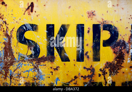 Side of an Old Yellow Skip Stock Photo - Alamy