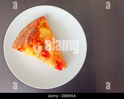 Cut off slice pizza on white background Stock Photo - Alamy