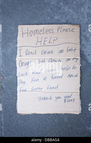 Homeless persons placard Stock Photo - Alamy