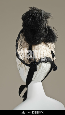 This woman's bonnet is a historical piece of fashion, demonstrating the ...