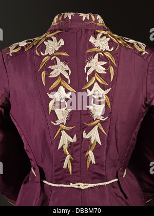 This dressing gown, made of fine material, exemplifies the textile and ...