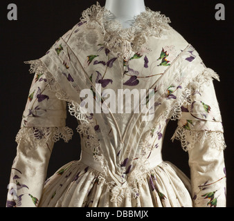 This dress is a historical garment that reflects the fashion and ...