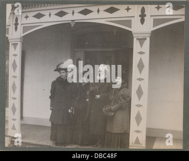 This photograph captures inventor Alexander Graham Bell surrounded by ...