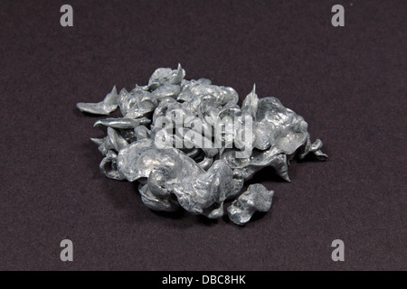 Granules of the metal zinc Zn, as used in a UK high school Stock Photo ...
