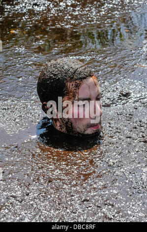 Dungannon, Northern Ireland, 28th July 2013 - Two women are submerged ...