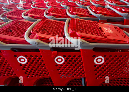 Line of red Target shopping carts with logos visible in parking lot in ...