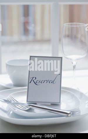 Restaurant reserved table sign ready for a romantic dinner. Reserved ...