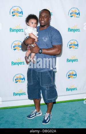 Shonn Greene and his son The Pampers 50th Birthday Celebration New York ...