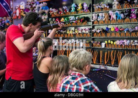 Shooting Gallery Stall With Gun And Targets Set Amongst Lots Of Fluffy ...