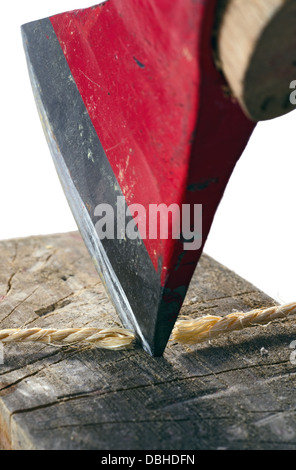 An ax cutting a rope. Isolated on white background Stock Photo - Alamy