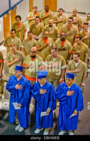 Three Hispanic inmates gather in the Womens Unit day room of the Santa ...
