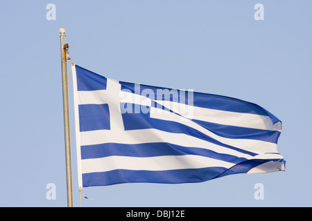The Greek flag flying in the wind on the island of Crete, Greece Stock ...