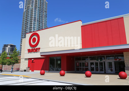 Building exterior of Target retail store with sign and logo with cars ...