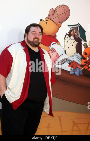 Travis Oates arriving at the "Winnie, the Pooh" Premiere at Walt Disney ...