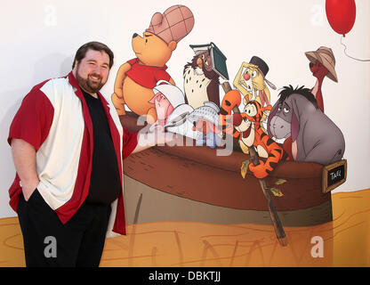 Travis Oates arriving at the "Winnie, the Pooh" Premiere at Walt Disney ...