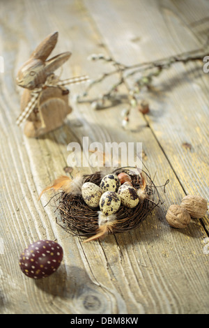 Easter decoration, egg nest on blue wooden table, top view. Spring ...