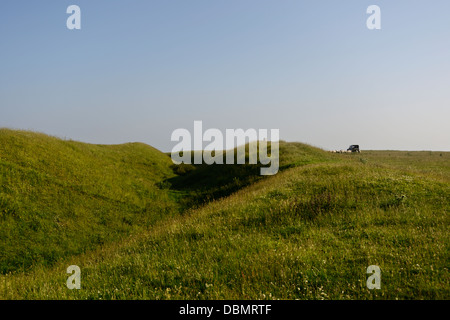 The earth ramparts of the iron age hill fort Uffington Castle on White ...