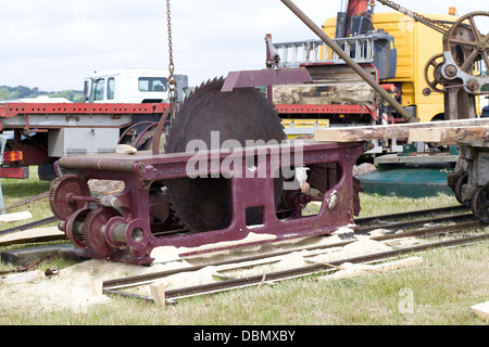 Vintage portable log saw working powered by tractor engine Stock Photo ...