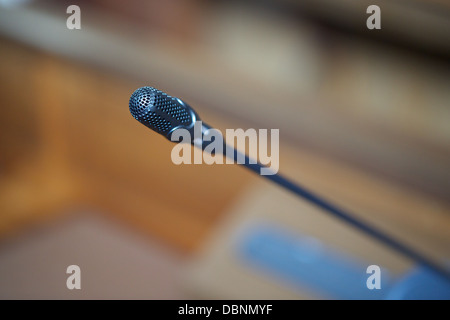 A speaker's microphone in a council chamber Stock Photo - Alamy