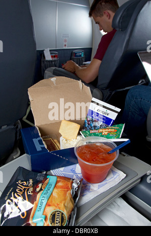 Airplane snack food on First Class flight Stock Photo - Alamy