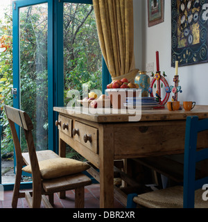 Wooden table and bench in the pine forest in autumn Stock Photo - Alamy