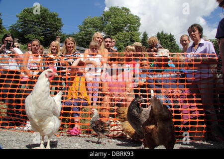 Competitors & their fowl at The Hen Racing World Championships outside ...