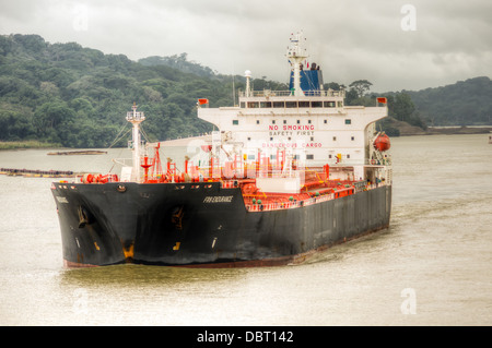 A cargo ship transits the Panama Canal in Panama City, Thursday, March ...
