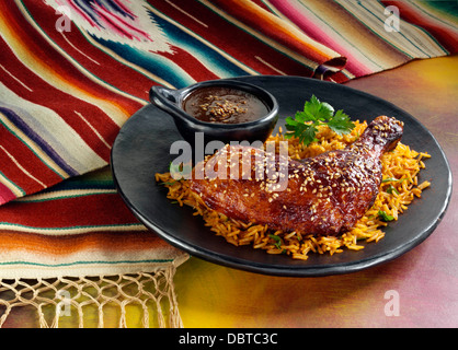 Lacquered chicken and red rice Stock Photo - Alamy