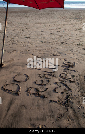 Message in Sand, Seminyak Beach, Seminyak, Bali, Indonesia Stock Photo ...
