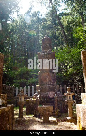 Japan, Koyasan, Okunoin forest cemetery. Row of traditional Toro stone ...