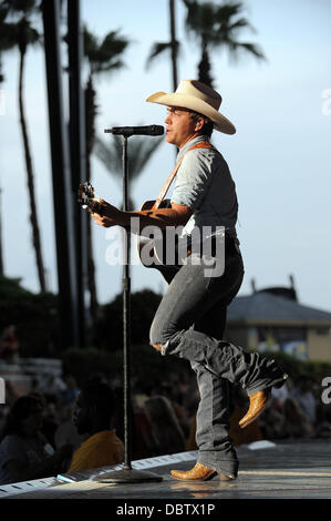 Justin Moore performs during the "Flatts Fest" tour at the Cruzan ...