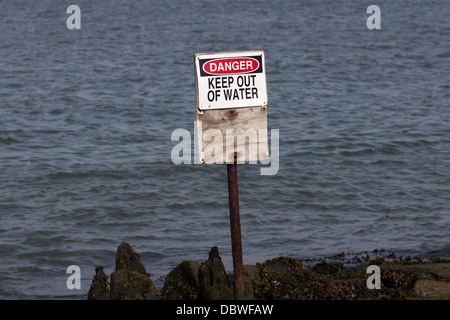 Polluted water warning sign Stock Photo - Alamy