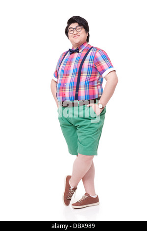 Full length portrait of overweight man with hands in pockets standing ...
