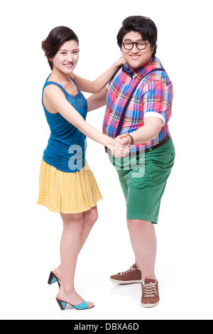 Overweight man dancing with girlfriend Stock Photo - Alamy