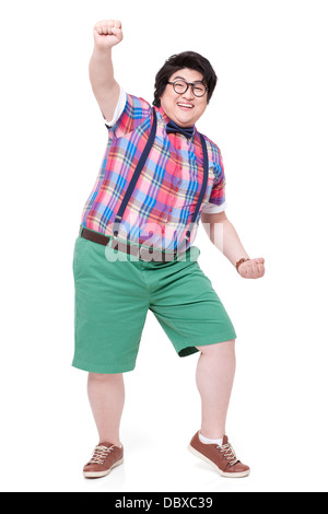 Excited young man punching the air Stock Photo - Alamy