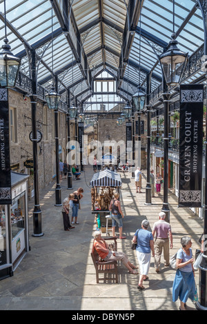 Small business storefronts in a strip mall including a sewing shop ...